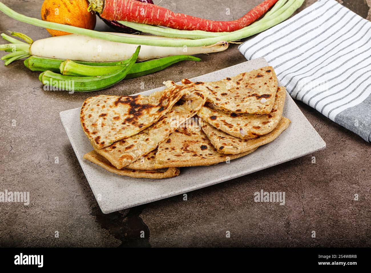 Indian vegetarian Aloo Paratha - bread with potato Stock Photo - Alamy