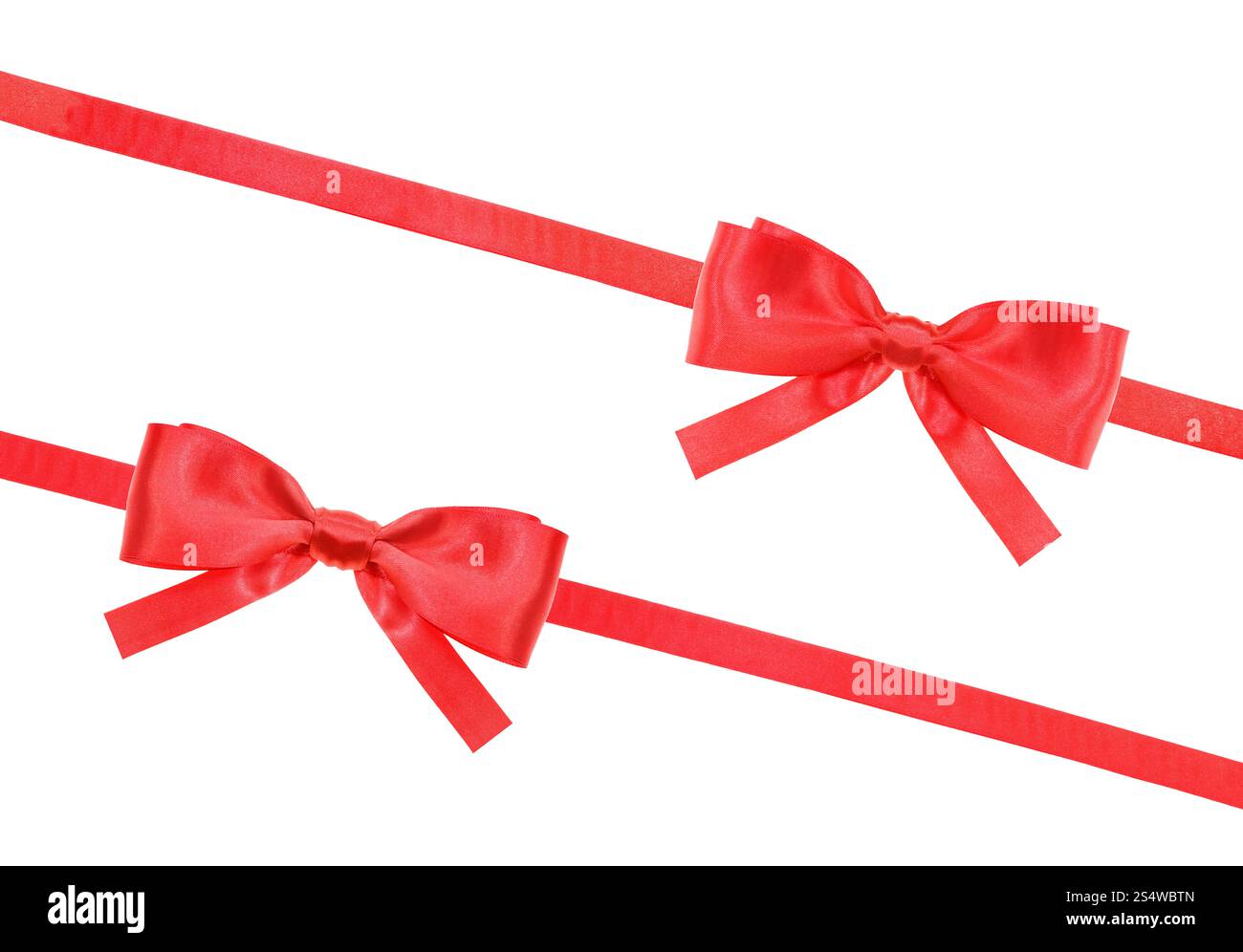two big red satin bows and two diagonal ribbons isolated on horizontal ...