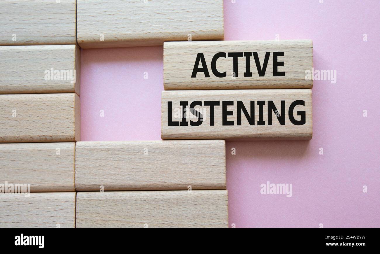 Active listening symbol. Wooden blocks with words Active listening ...