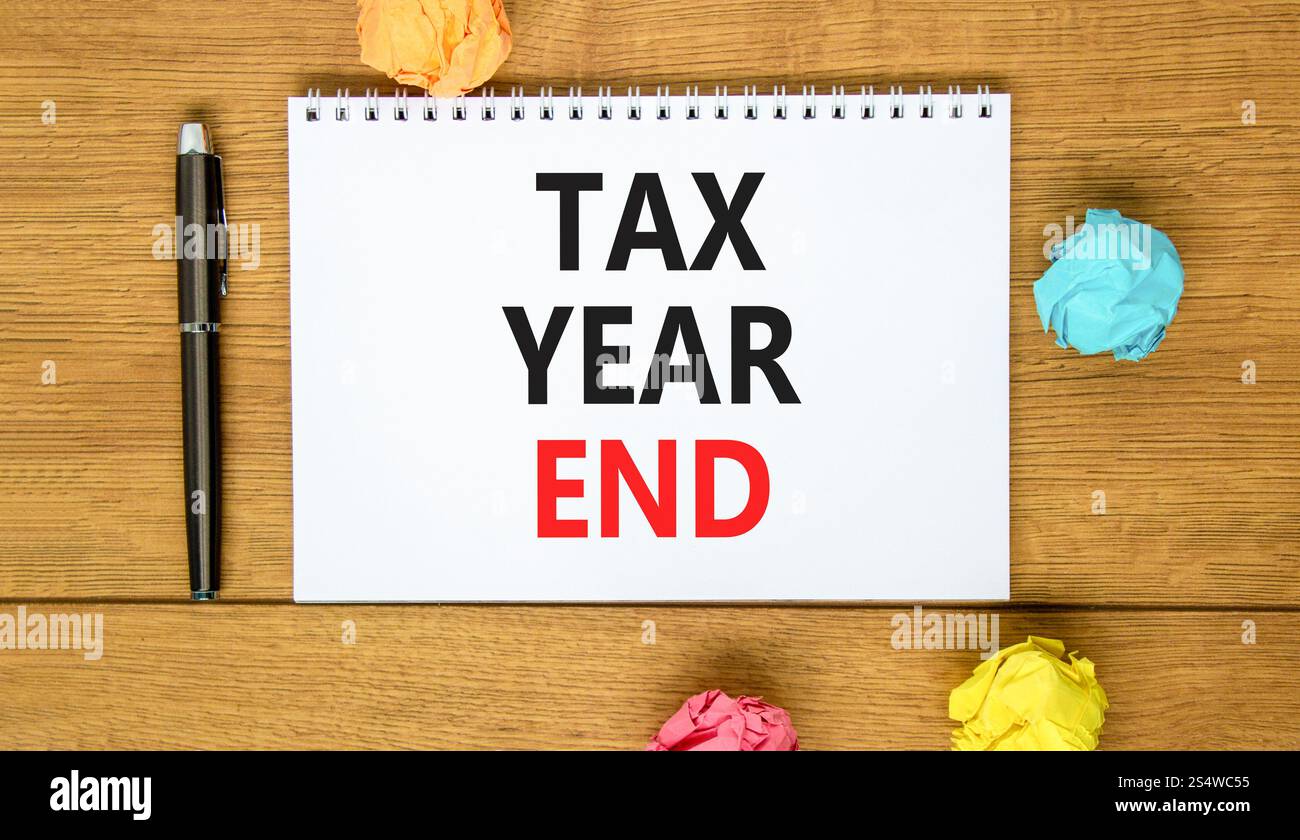 Tax year end symbol. Concept words Tax year end on beautiful white note ...