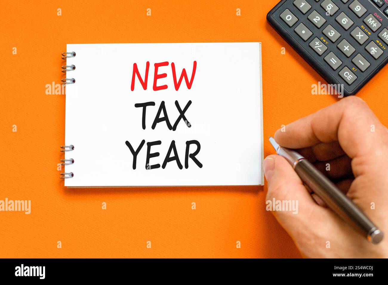 New tax year symbol. Concept words New tax year on beautiful white note ...