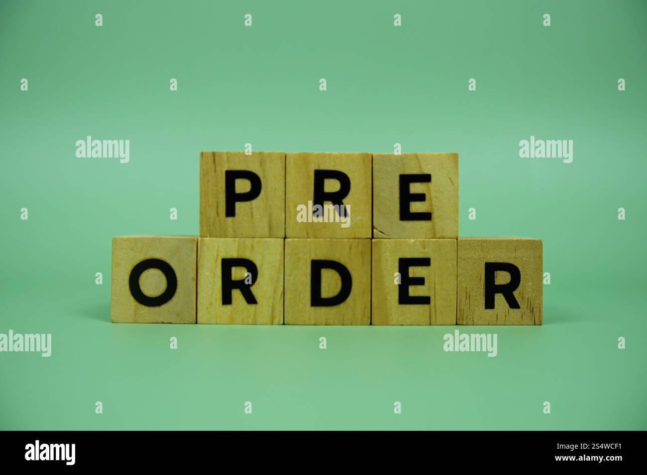 Pre Order with wooden blocks alphabet letters on wooden background ...