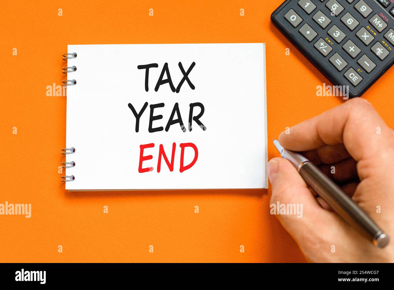 Tax year end symbol. Concept words Tax year end on beautiful white note ...