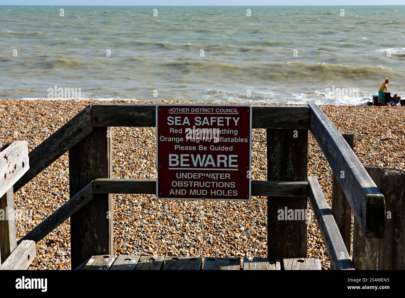 A beachside sign in Bexhill, Kent, UK warning swimmers of dangerous ...