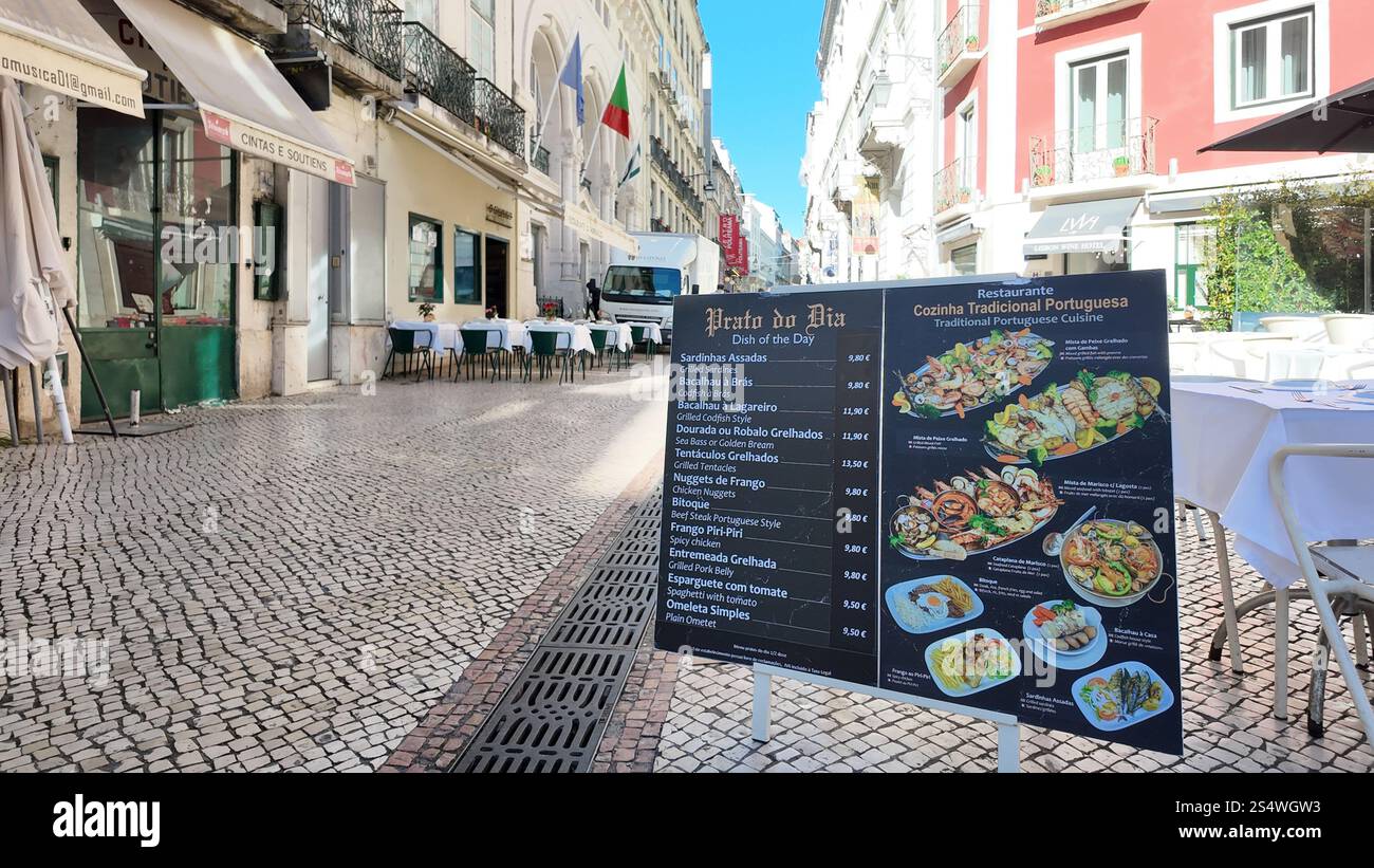 Outdoor restaurant menu displaying various dishes and prices in Lisbon ...