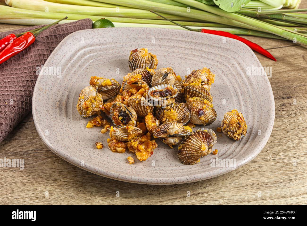 Blood Cockle Fried With Garlic and spices Stock Photo - Alamy