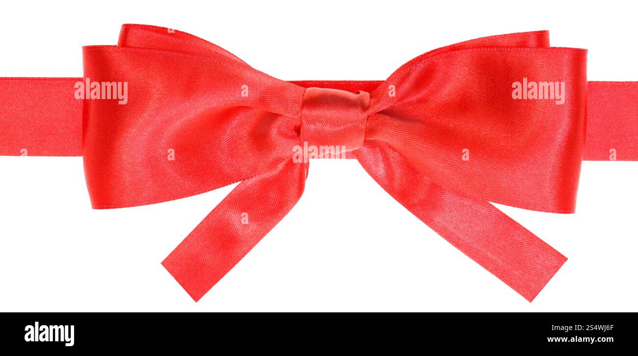 real red satin bow with square cut ends on ribbon close up isolated on ...