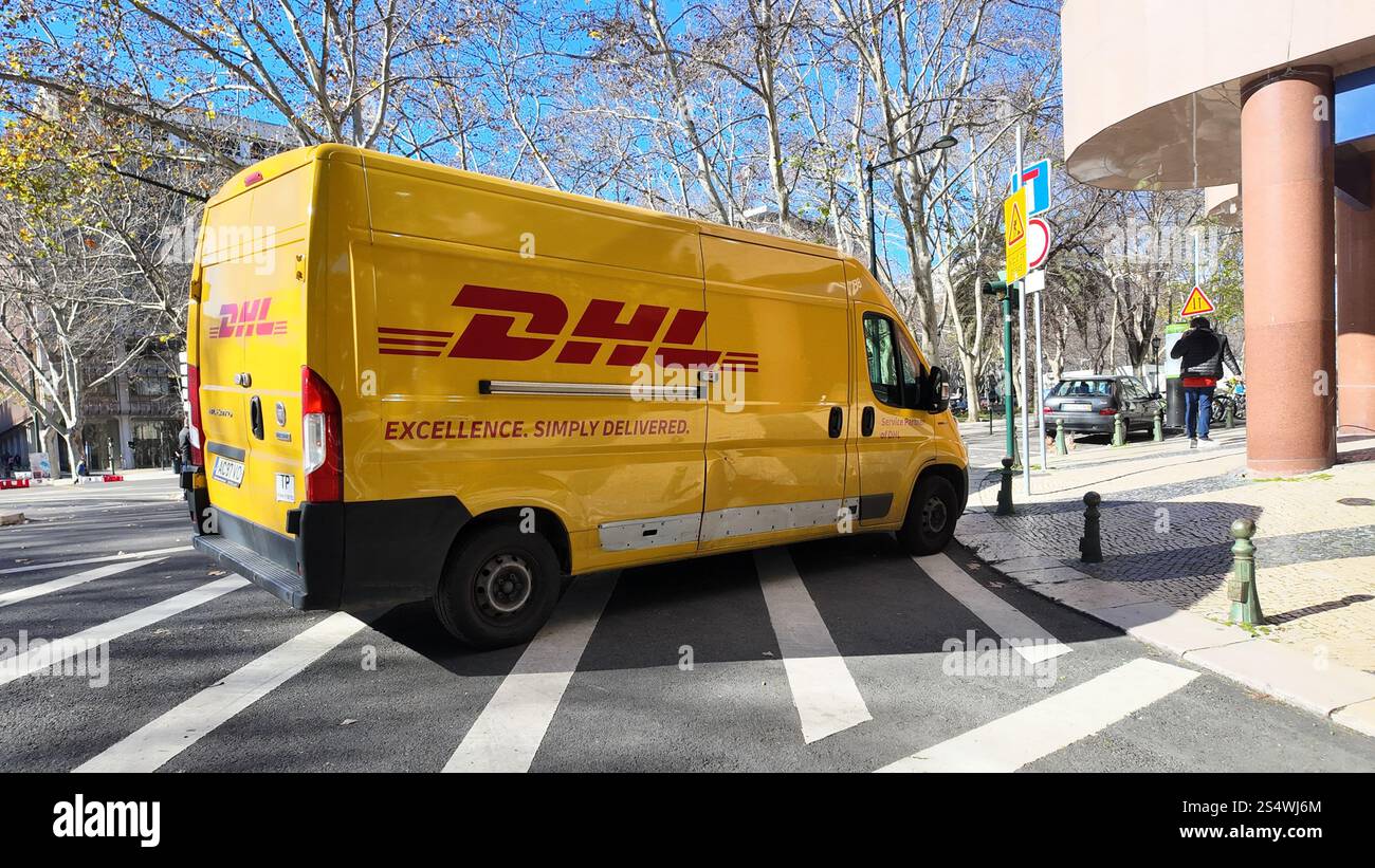 A yellow DHL delivery van parked on the street Stock Photo - Alamy
