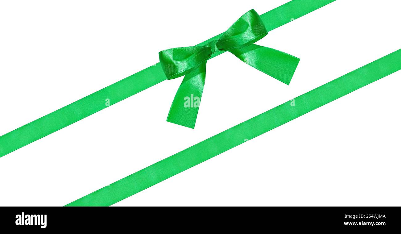 green bow knot on two diagonal silk bands isolated on white background ...