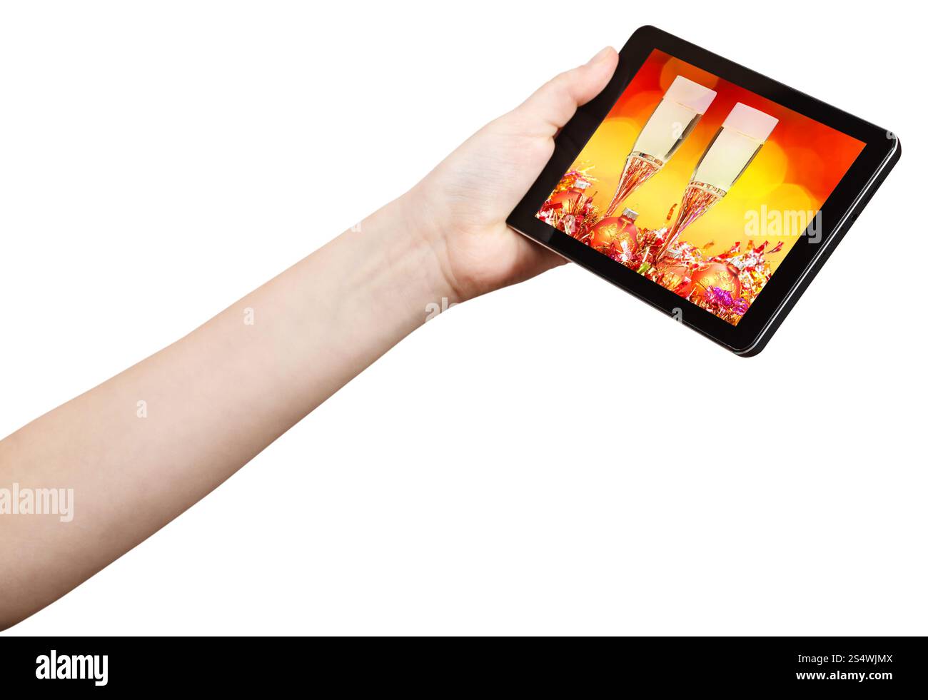 hand holds tablet-pc with Xmas still life on screen isolated on white ...
