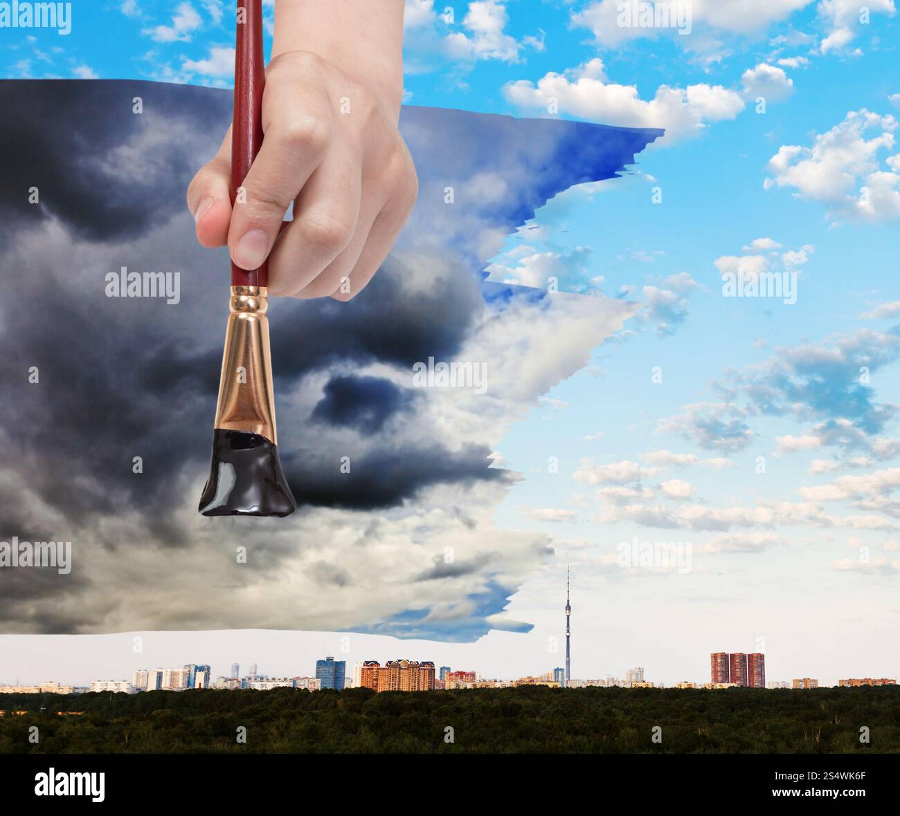 nature concept - seasons and weather changing: hand with paintbrush ...