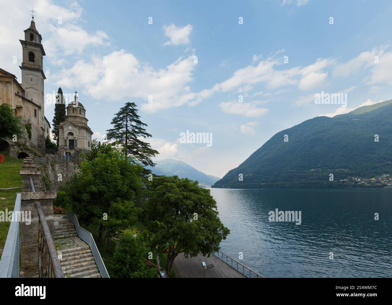 Lake Como (Italy) coast summer view with church Stock Photo - Alamy