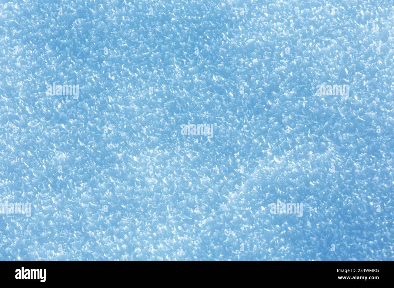 Snow crystals close-up. Snowy background Stock Photo - Alamy