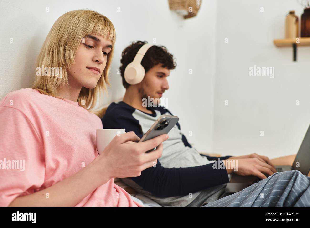 Two loving men spend a comfortable evening together, engaging with ...