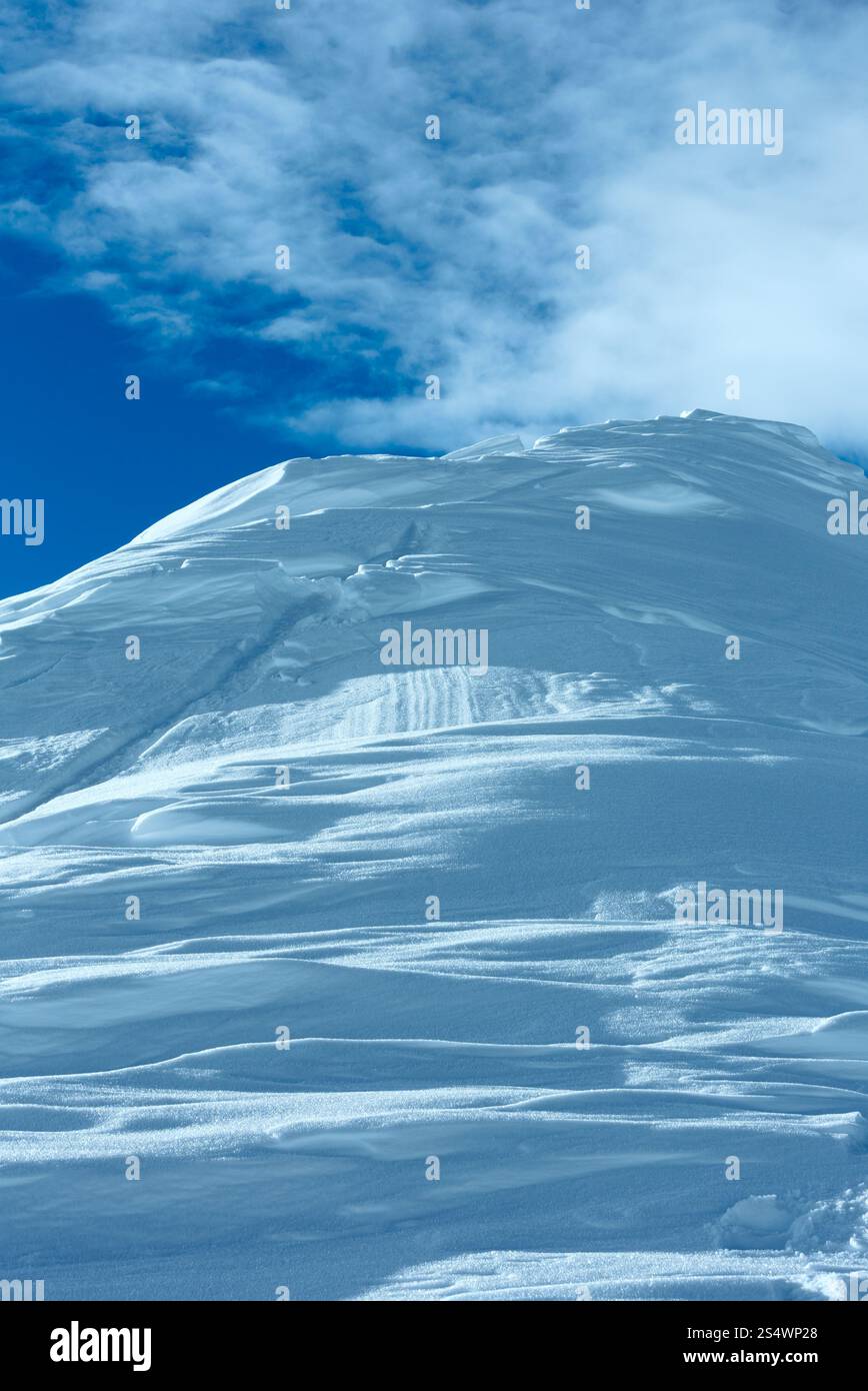 Morning winter snowy mountain hill and cloudy sky Stock Photo - Alamy