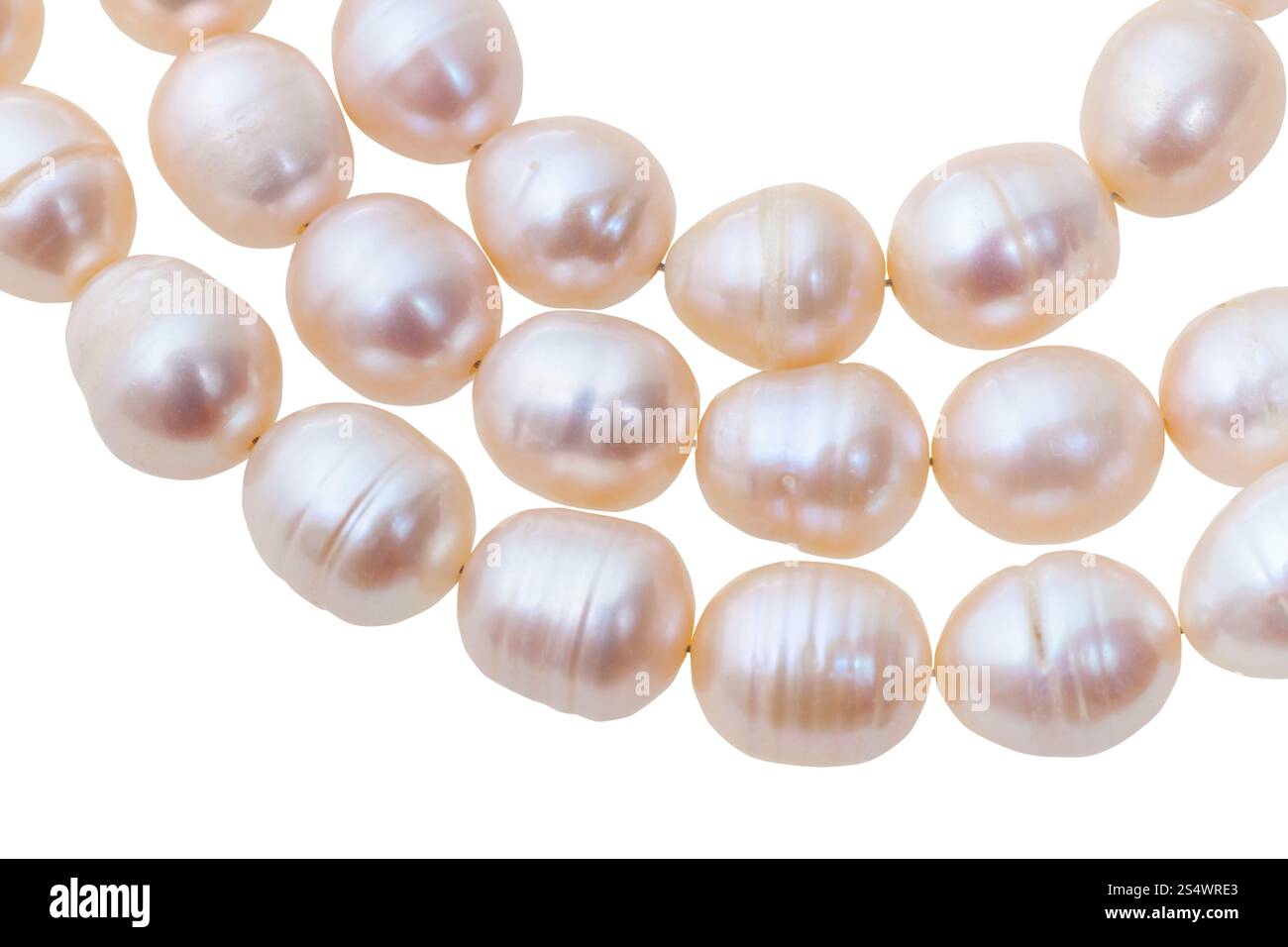 three strings of beads from natural pink river pearls close up isolated ...