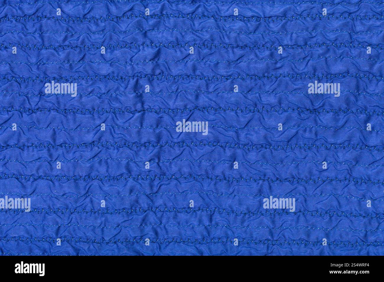 textile background from stitched wrinkled blue silk fabric Stock Photo ...