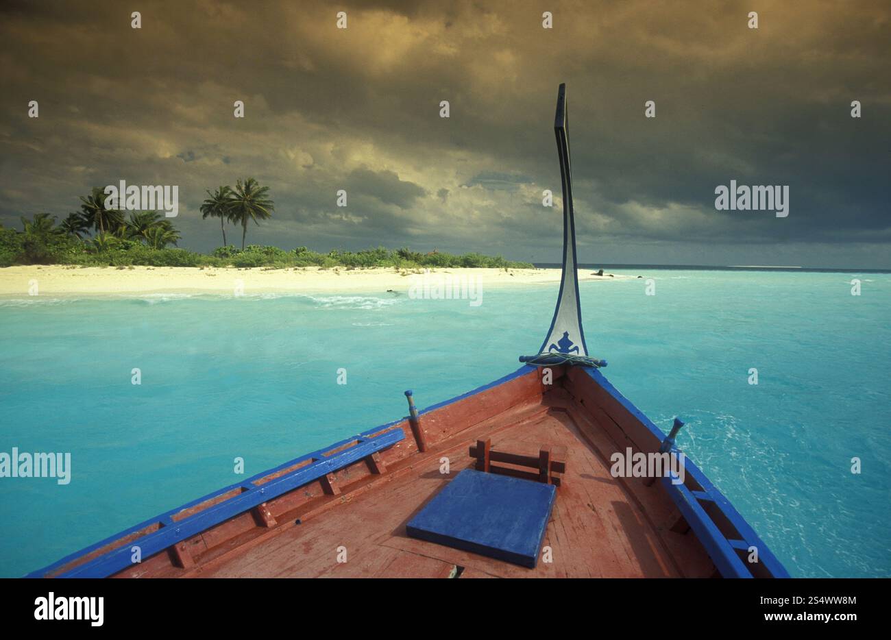 a dhoni Boat on the coast of the island and atoll of the Maldives ...