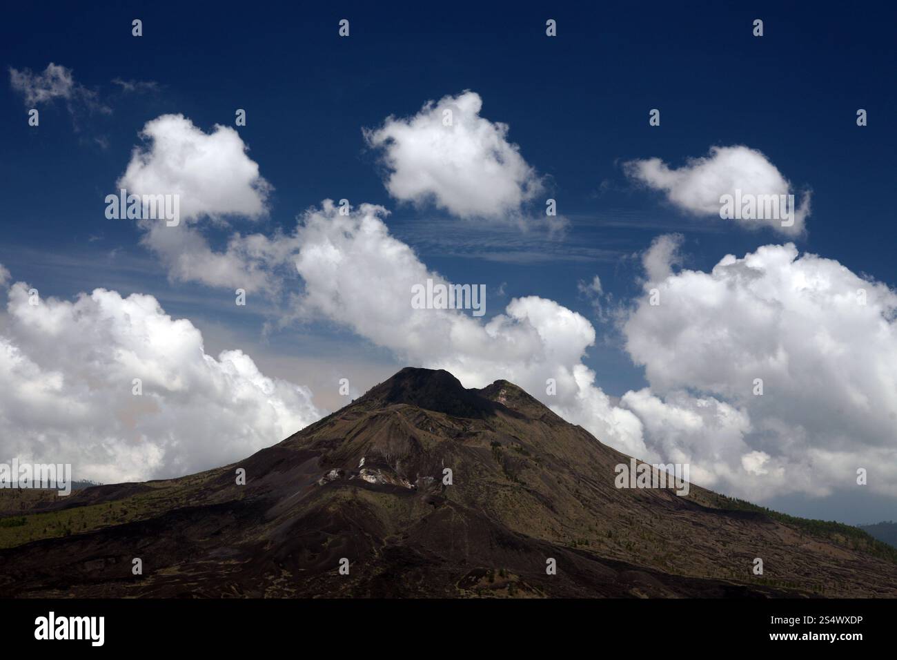 the landscape at the Lake Batur with the volcano Mt. Batur on the ...