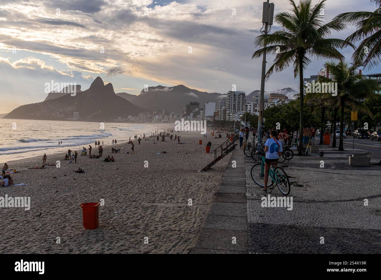 People gather on Leblon Beach at sunset, Rio De Janeiro, Brazil Stock ...