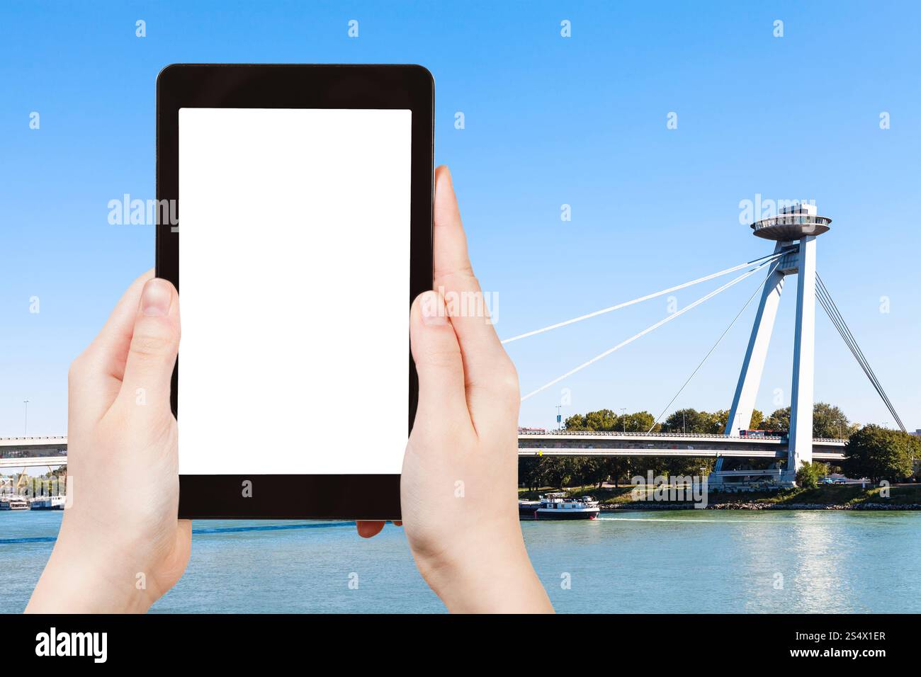 travel concept - tourist photographs of SNP Bridge (UFO bridge, Novy ...