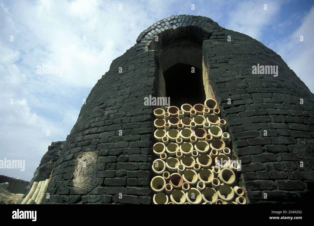 workers in a pottery factory in the old town of Cairo the capital of ...