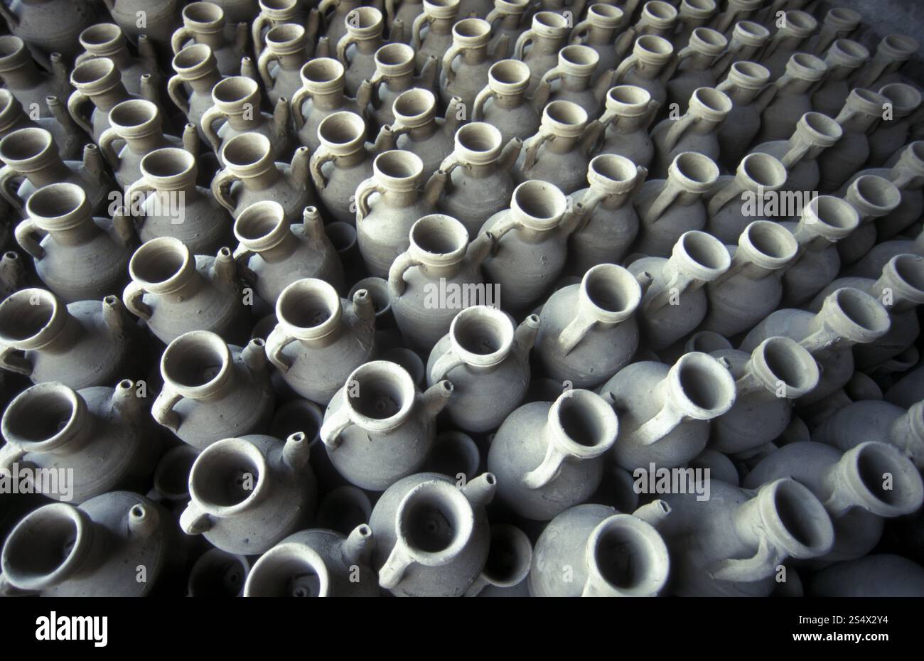 workers in a pottery factory in the old town of Cairo the capital of ...