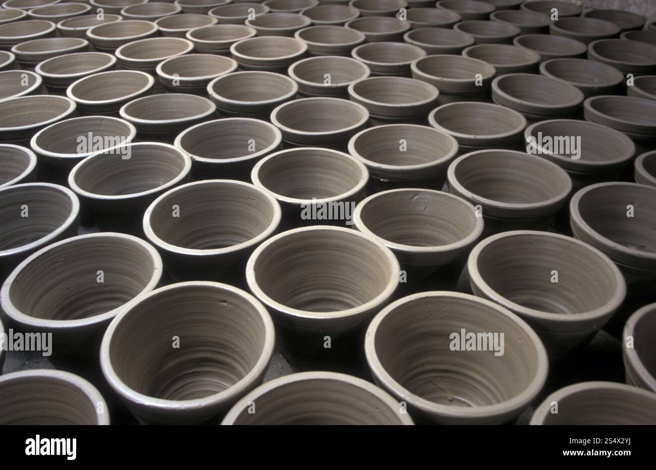 workers in a pottery factory in the old town of Cairo the capital of ...