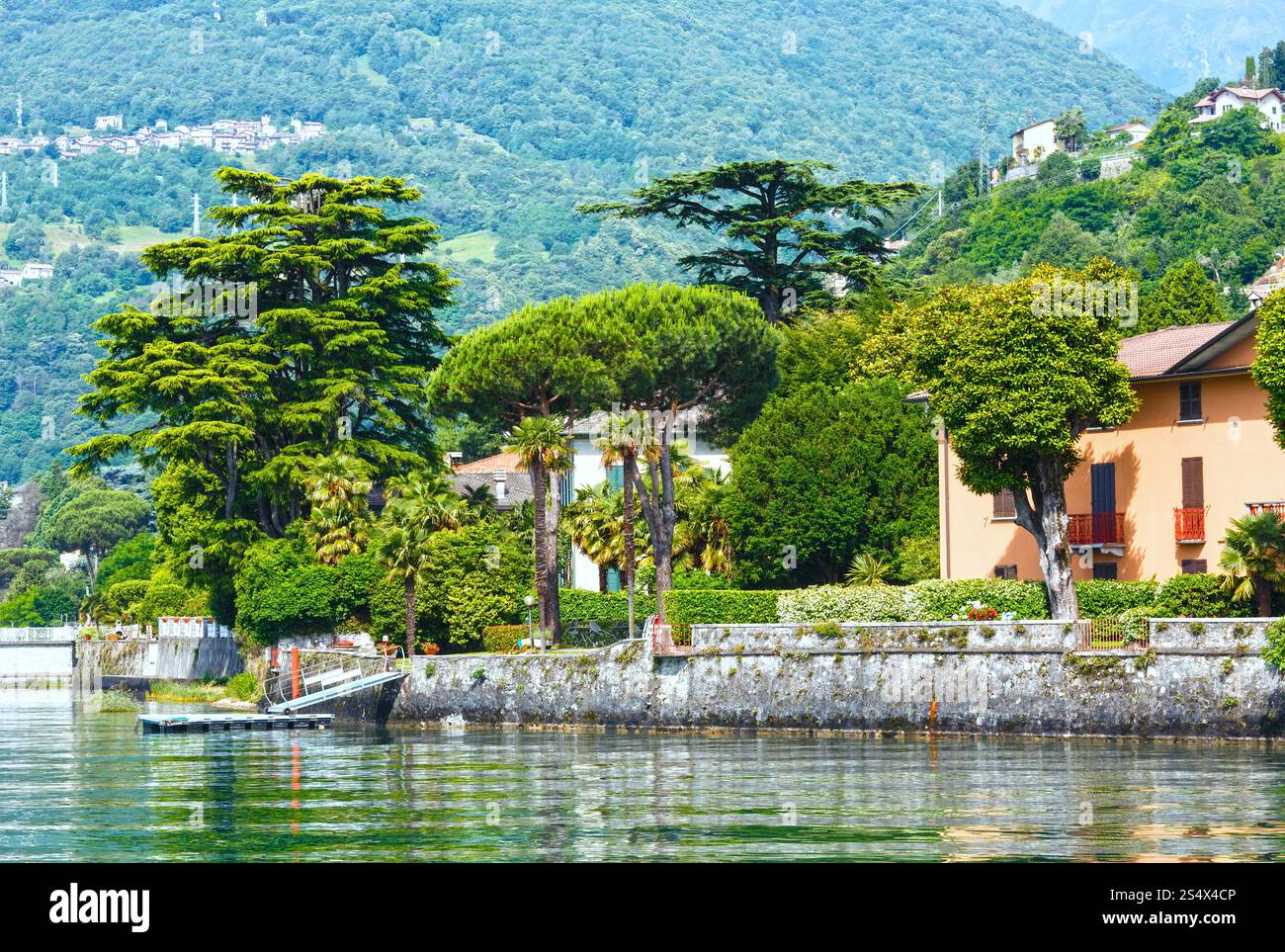 Lake Como (Italy) shore summer view from ship board Stock Photo - Alamy