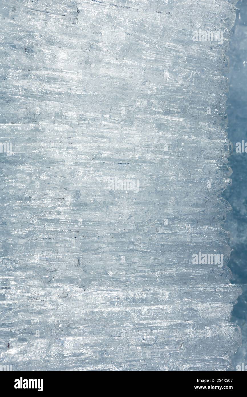Glacial block of ice with interesting structure crystals macro. Winter ...