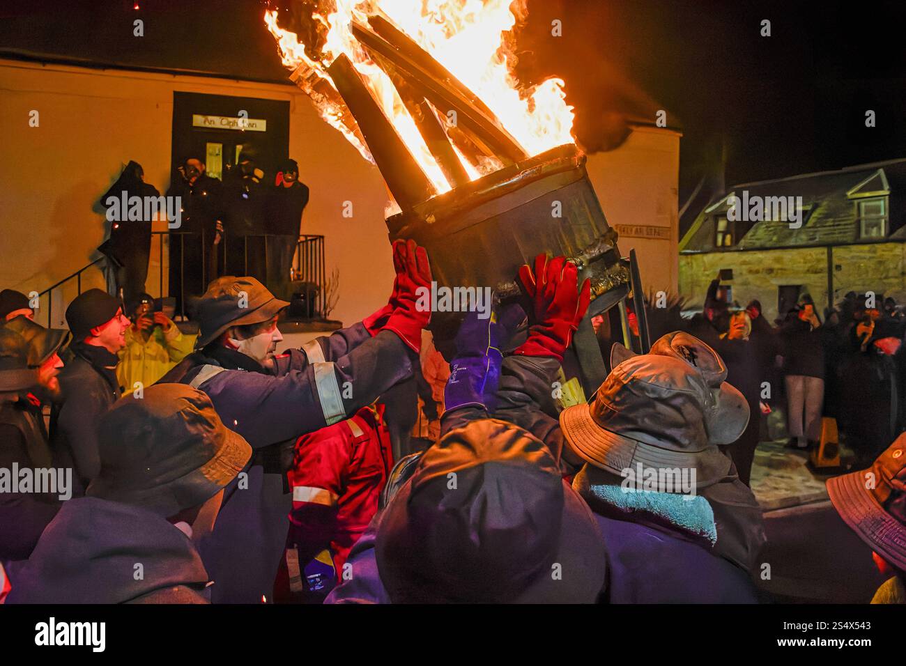 Burning of the Clavie 2025 Burghead Moray Scotland lifting and holding ...