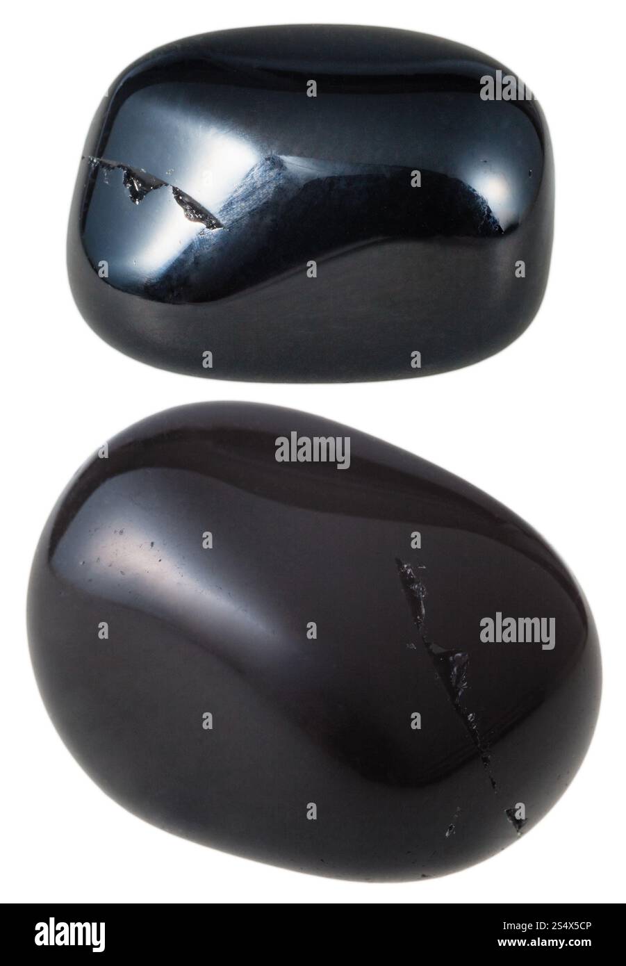 natural mineral gem stone - two Black Onyx gemstones isolated on white ...