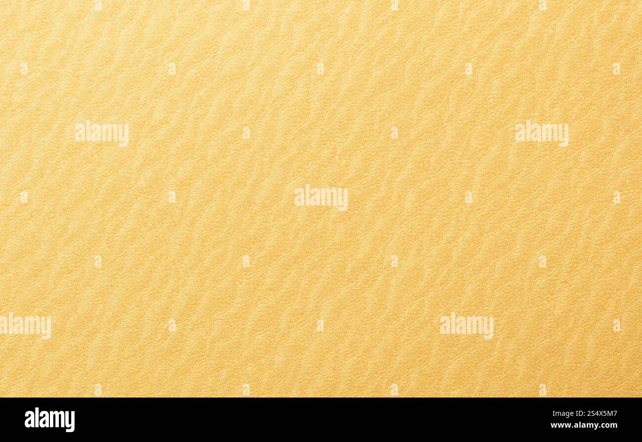 Golden yellow paper background with rippled, wavy textures and a smooth ...