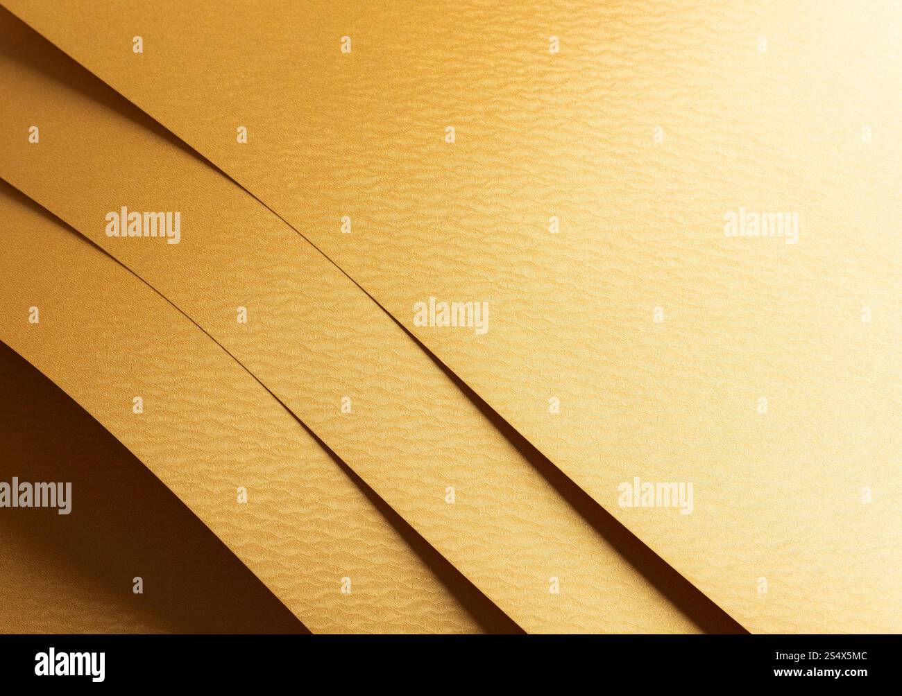 Golden yellow paper background with rippled, wavy metallic textures and ...