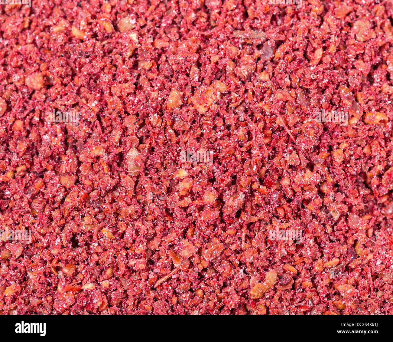 food background - ground sumac ( sumach, rhus) spice close up Stock ...