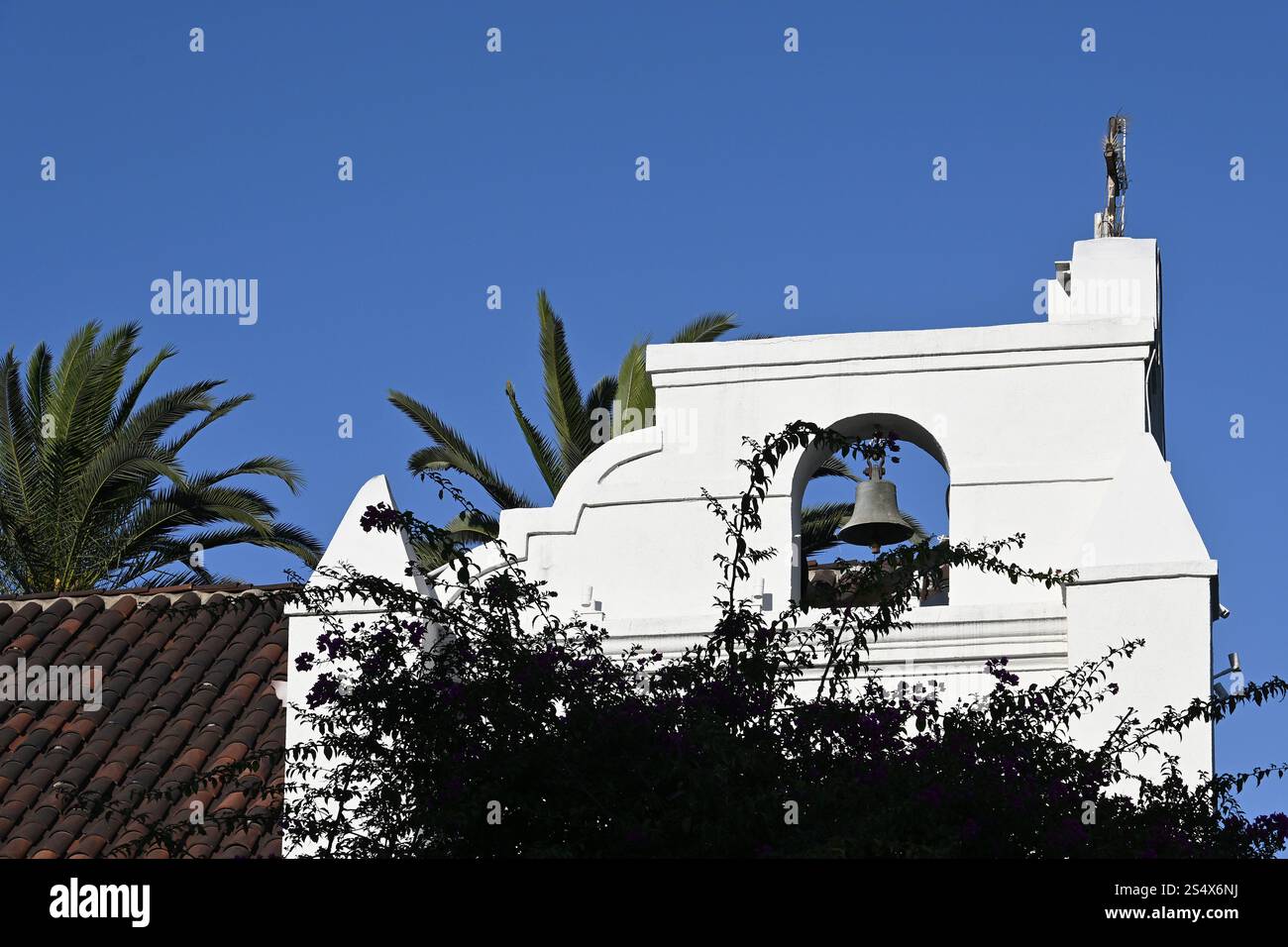 LOS ANGELES, CALIFORNIA - 2 DEC 2024: Bell and cross atop Our Lady ...