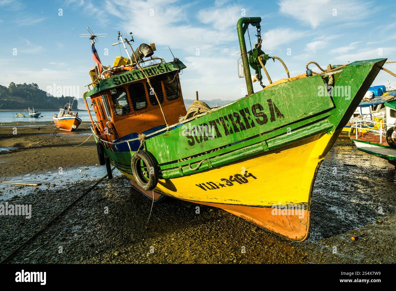 Stranded boats at low tide, Dalcahue, Chiloé Island, Patagonia, Republic of Chile, South America ...