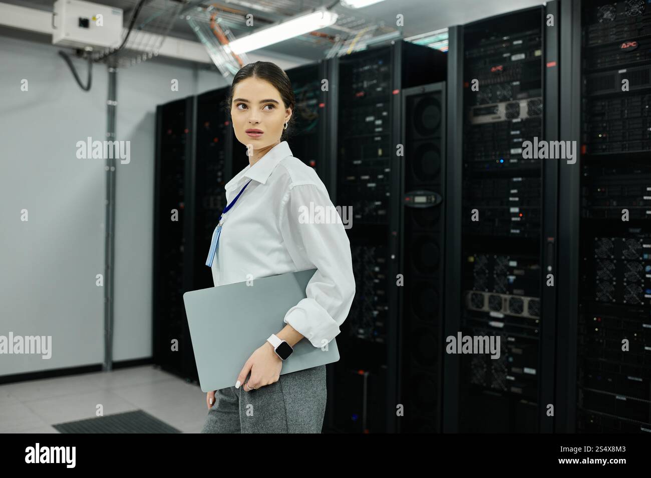 Professional woman in white shirt analyzes server hardware in a high ...