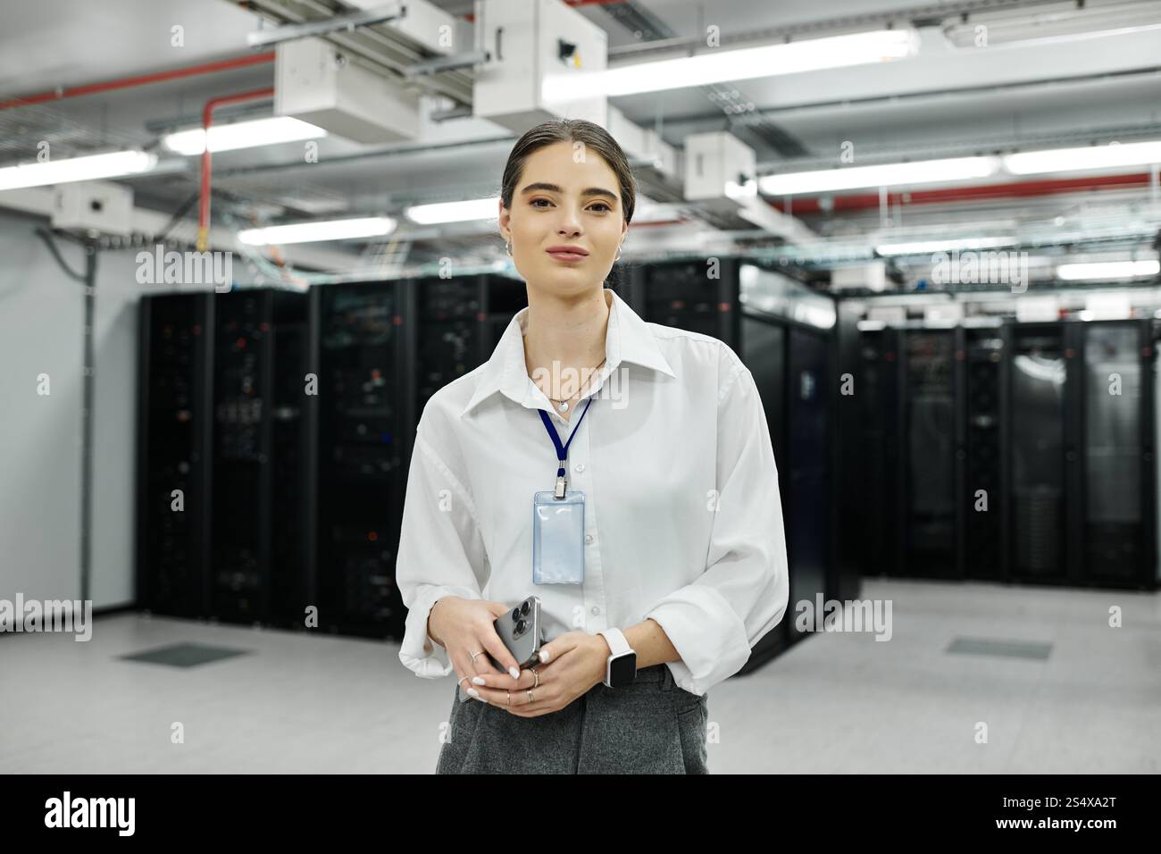 Data center system administrator oversees hi-res stock photography and ...