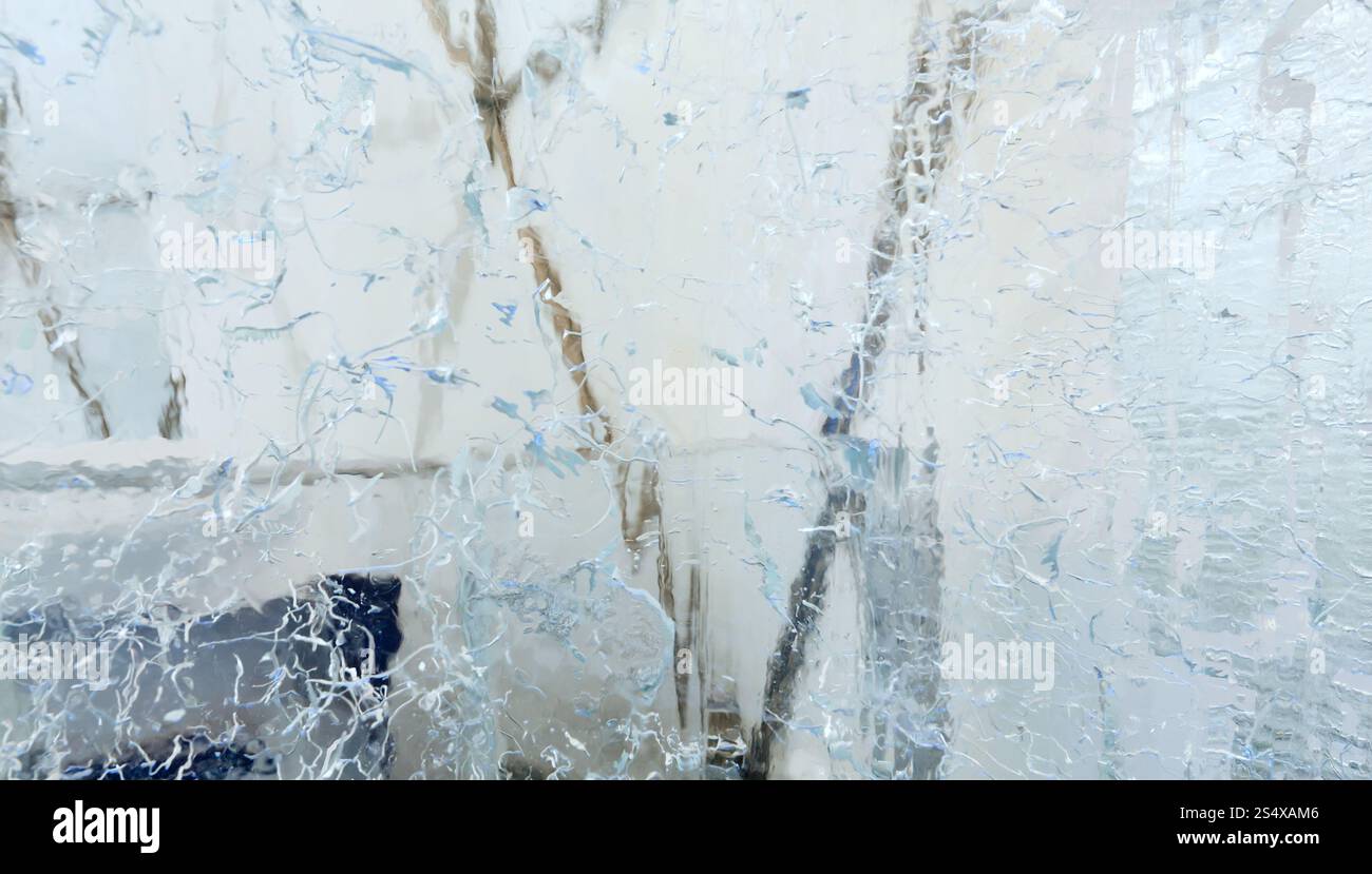 Glacial transparent wall of ice with interesting drawings and patterns ...