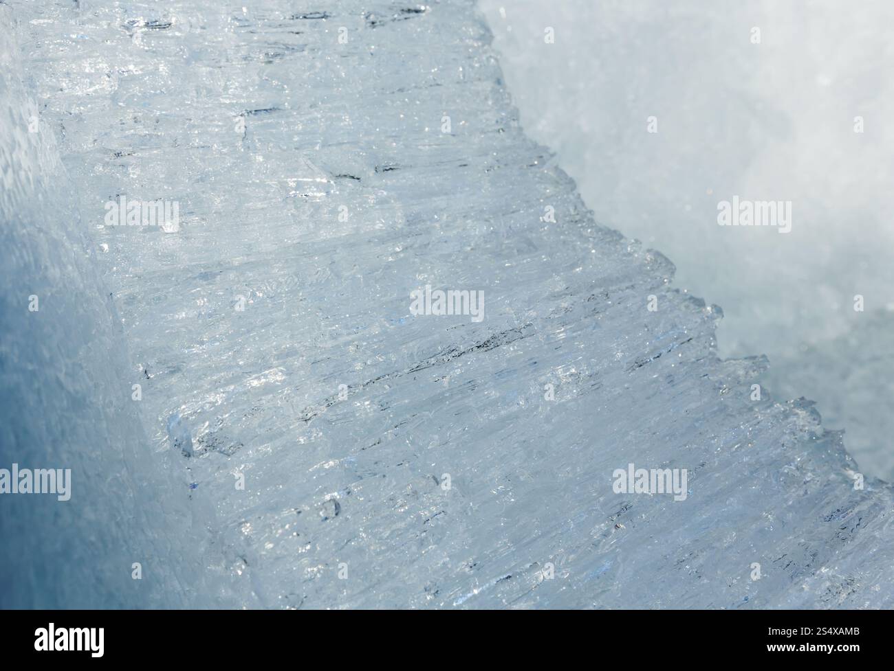 Glacial block of ice with interesting structure crystals macro. Winter ...