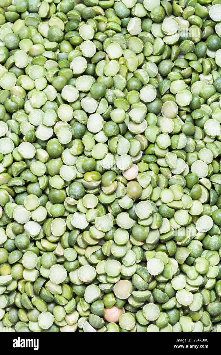 food background - many raw green split peas Stock Photo - Alamy