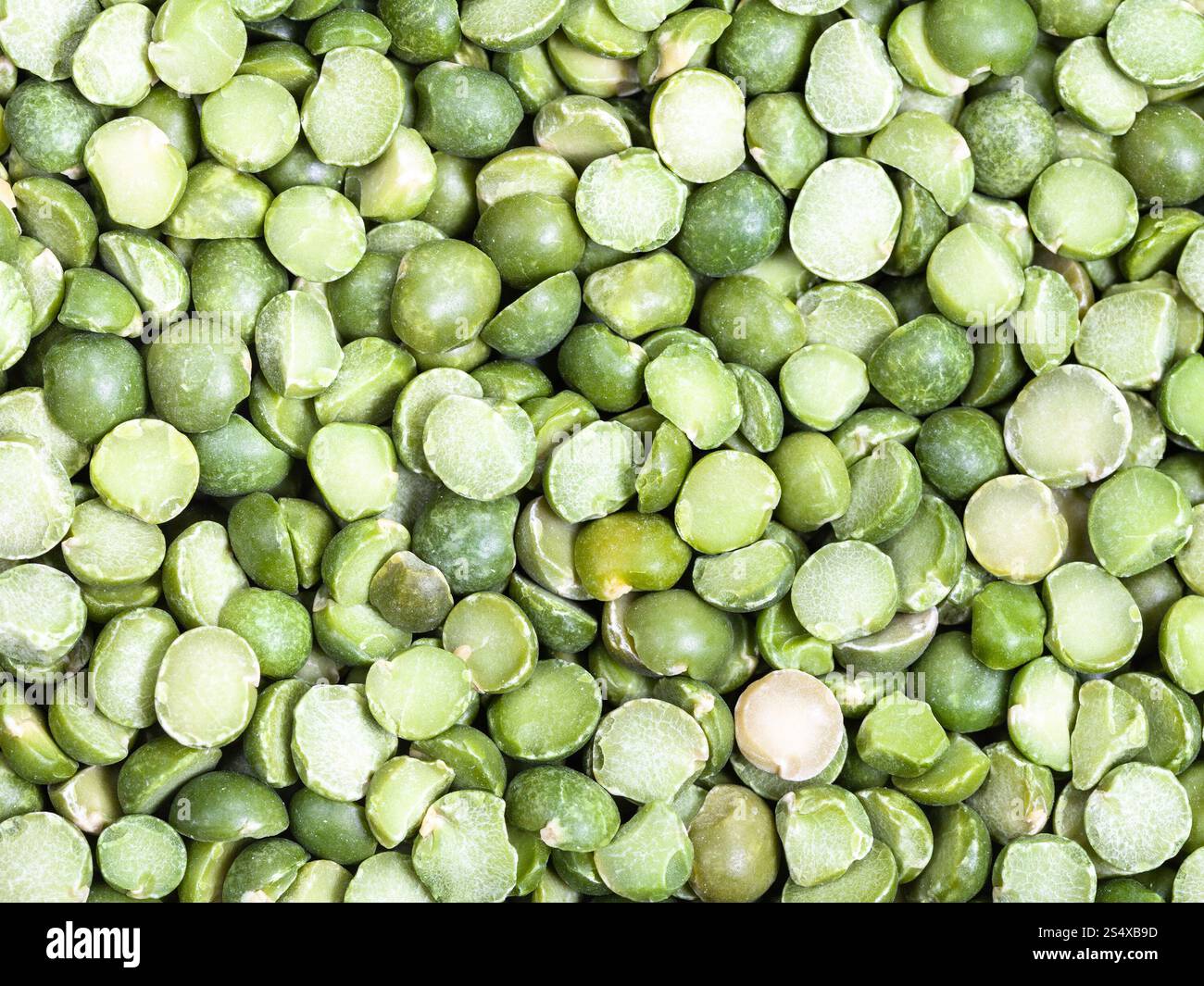 food background - raw green split peas Stock Photo - Alamy