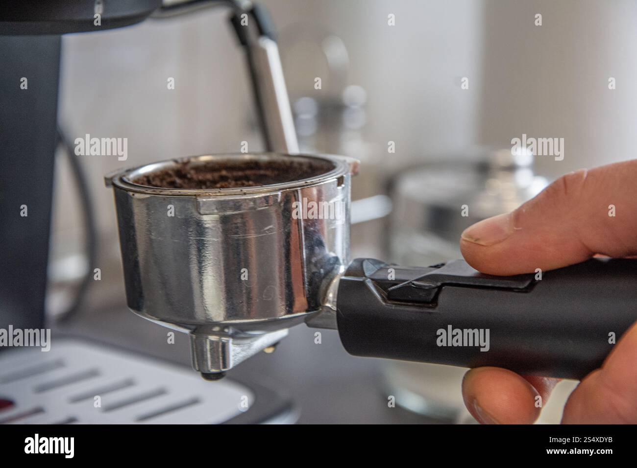 Process grinding coffee in machine hi-res stock photography and images ...