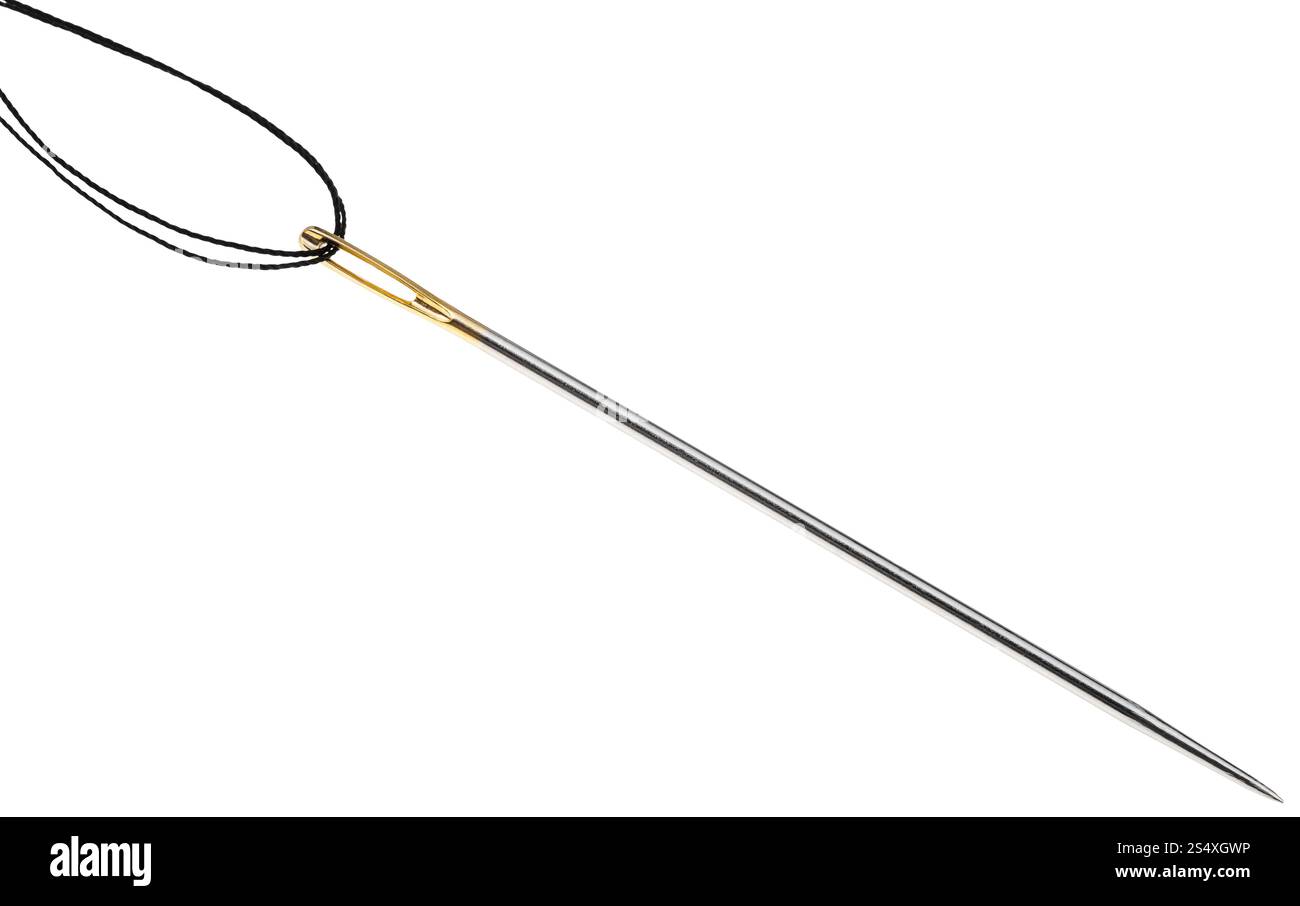 sewing needle with black thread threaded through the golden needle's ...