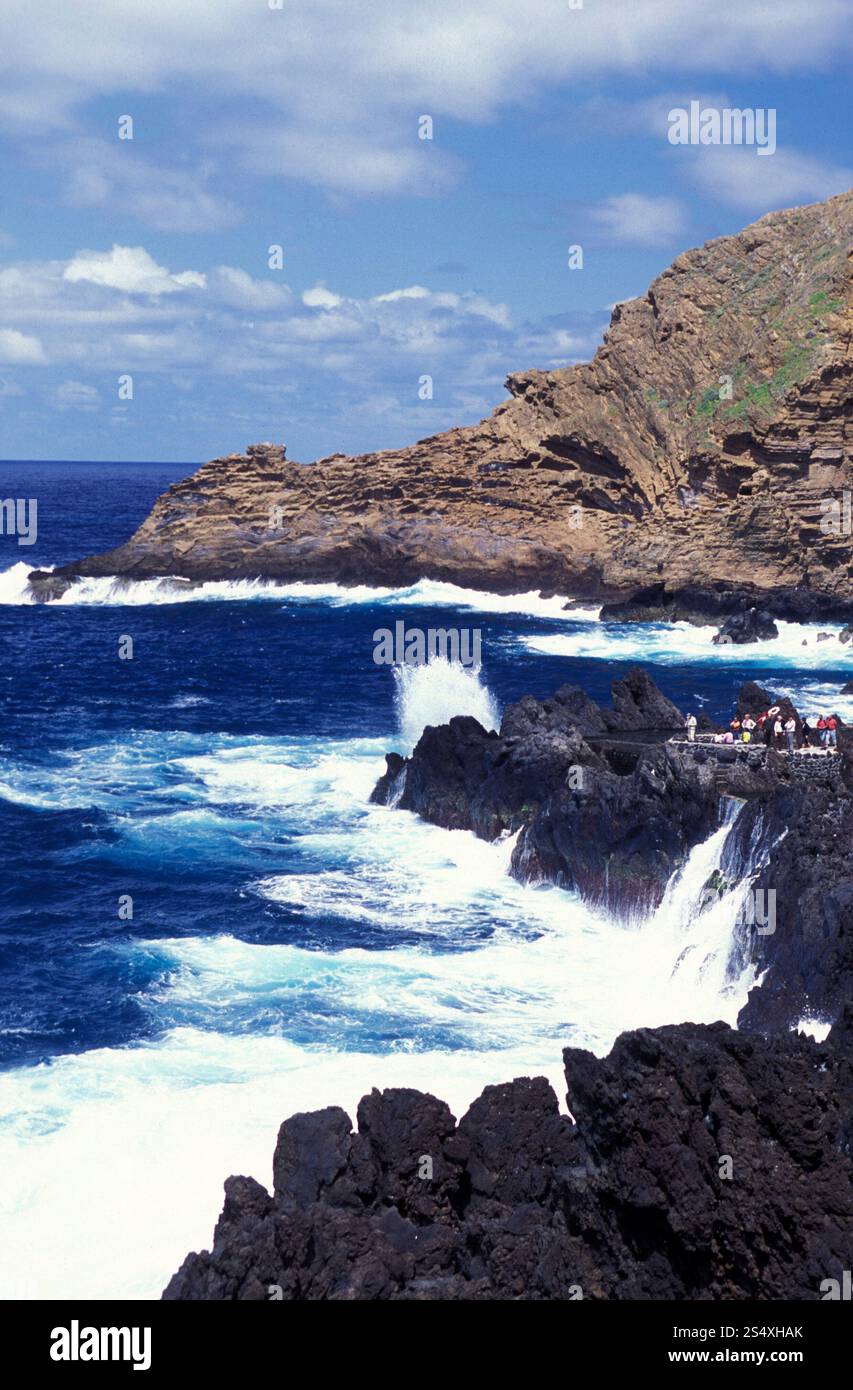 the landscape and coast at the old town of Porto Moniz on the Island of ...