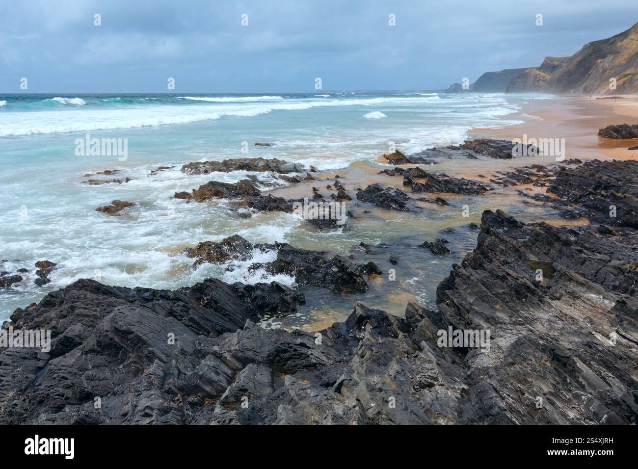 Storm on Castelejo beach with black schist cliffs (Algarve, Portugal ...