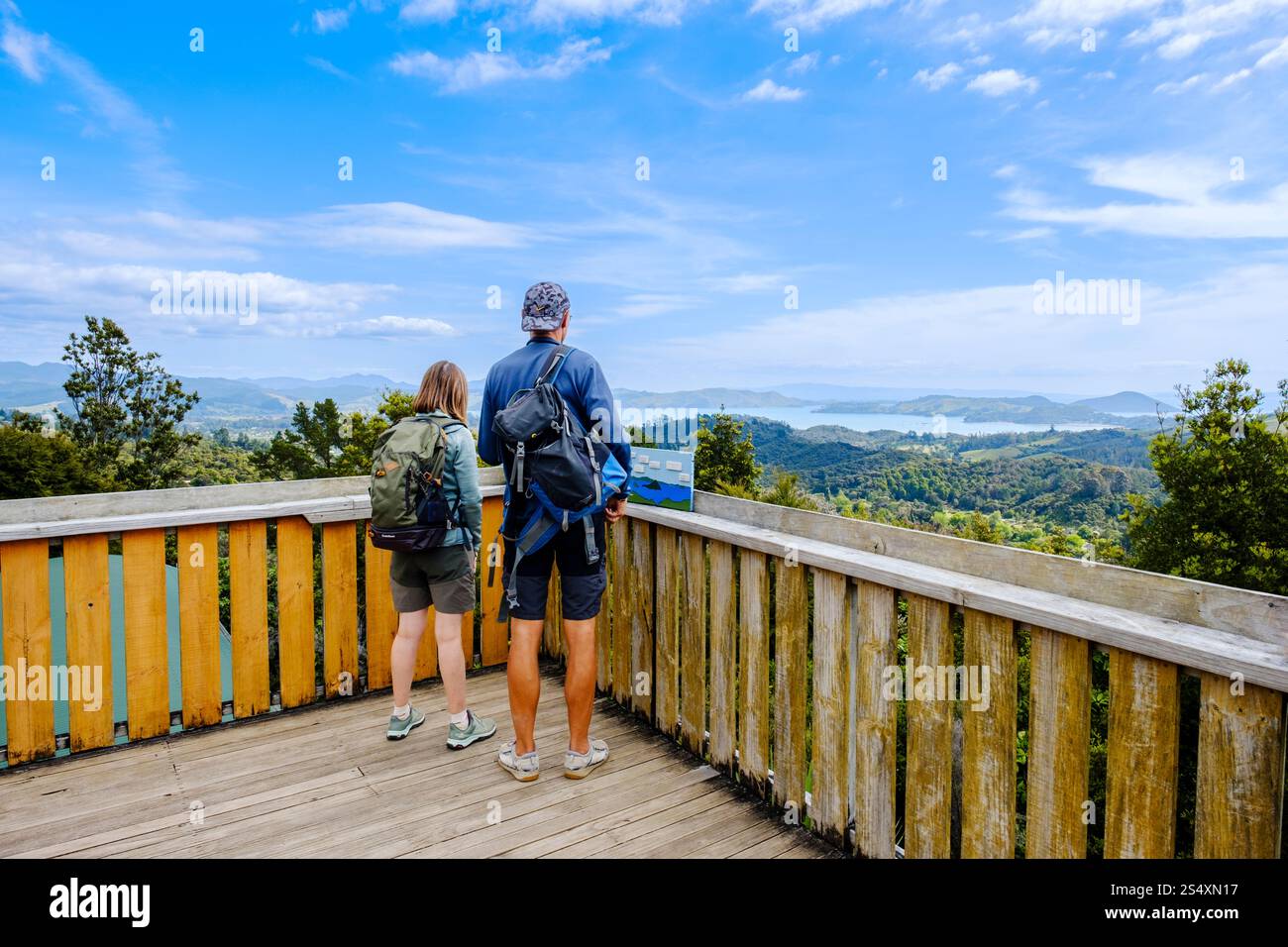 Tourists enjoy panoramic views of the Hauraki Gulf from the Eyefull Tower at Driving Creek ...