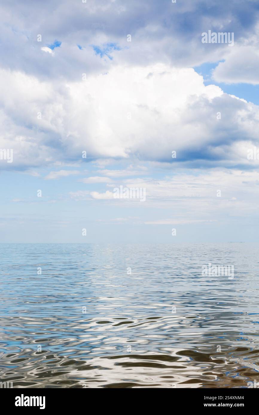 white clouds over calm water of Azov Sea, Temryuk bay, Golubitskaya ...
