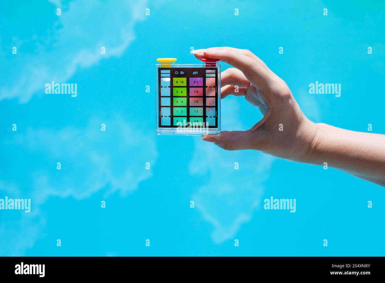 measuring chlorine pollution in blue water of outdoor pool by chemical ...